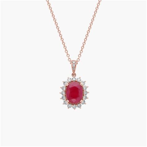 Oval Ruby And Diamond Sunburst Halo Pendant In 14k Rose Gold 9x7mm