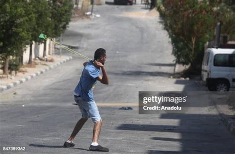 Throwing Sling Photos And Premium High Res Pictures Getty Images
