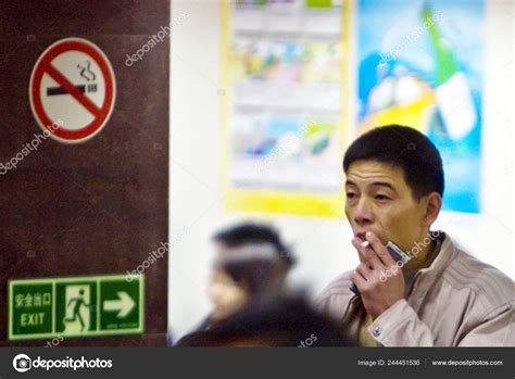 Chinese Man Smokes Next Smoking Sign Long Distance Bus Station — Stock