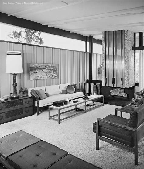 The Modernist A Modernist Stone And Metal Fireplace Is A Living Room