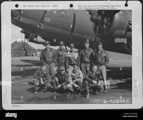 A Crew Of The 379th Bomb Group Poses Beside A Boeing B 17 Flying