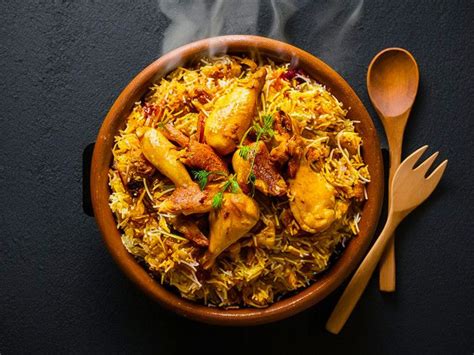 Top View Of A Malabar Chicken Dum Biryani Served In Round Clay Pot
