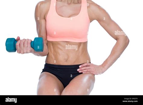 Strong Woman Doing Bicep Curl With Blue Dumbbell Stock Photo Alamy
