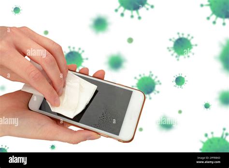 Hands Wiping The Phone Screen With An Antibacterial Wipe Close Up