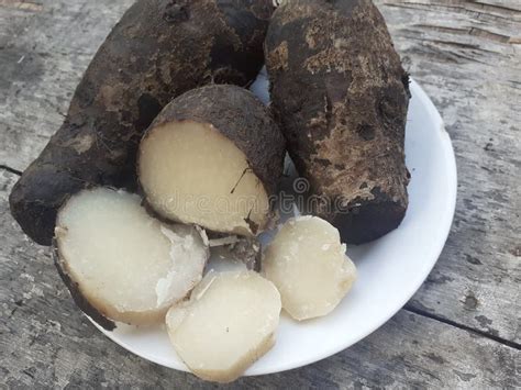 Close Up Of Boiled Kimpul Food On A Small Plate Wooden Background Stock Image Image Of