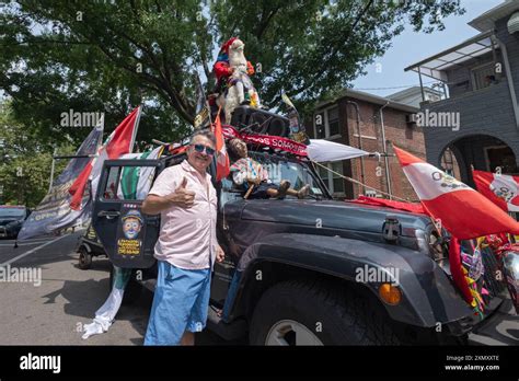 Queens Resident And Peruvian Native Payasito Chiquitín A Clown For Hire Near His Jeep Float For