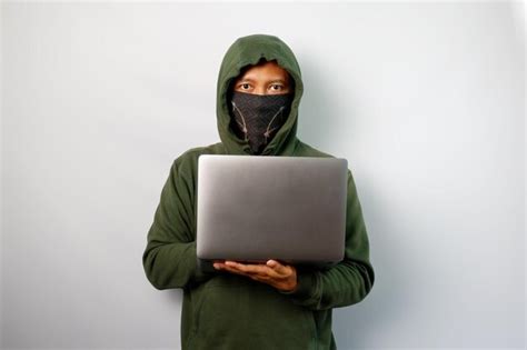 Premium Photo Hacker Using Laptop To Steal Personal Data From People
