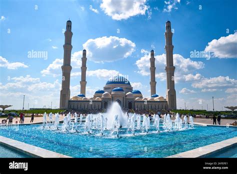 A View Of The Front Entrance To The Huge Mosque With A Series Of Blue