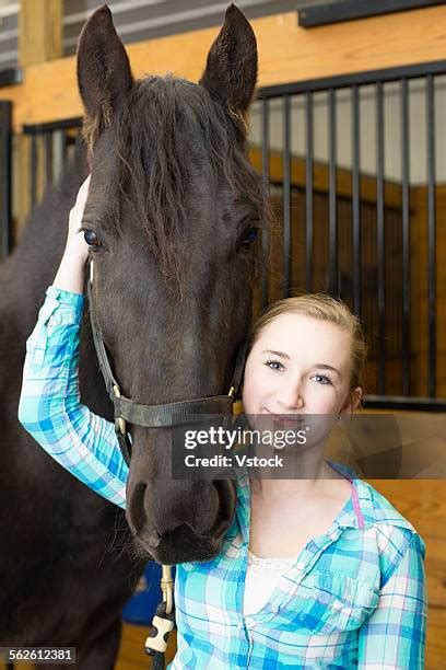 Teenage Girls At The Horse Stable Photos And Premium High Res Pictures