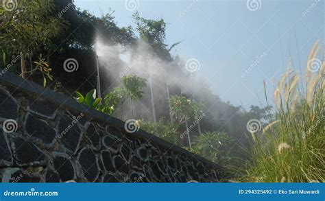 Water Is Sprayed From A Misting Device Stock Footage Video Of Outdoors Cool 294325492