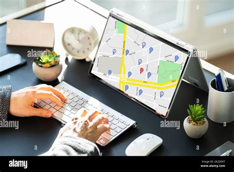 Man Using GPS Map With Navigation Pointers Stock Photo Alamy