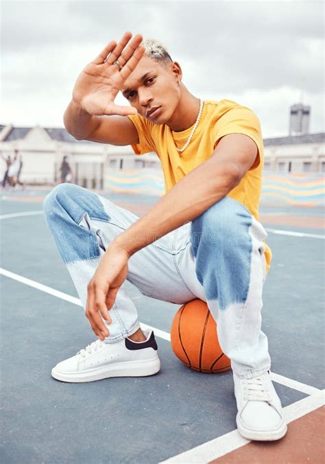 Basketball Fashion And Portrait Of Black Man On Basketball Court With Hand Frame For Beauty