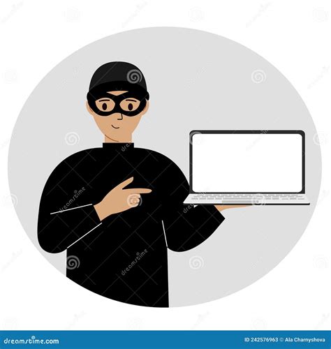 Hacker In A Black Mask With A Computer The Cybercriminal Is Holding A