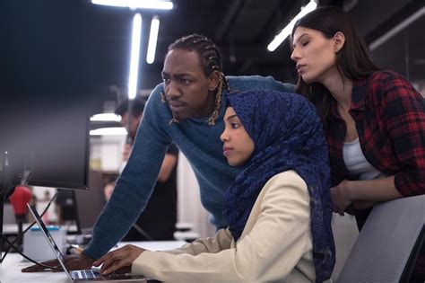 Premium Photo Young Multiethnics Business Team Of Software Developers Working Together Using