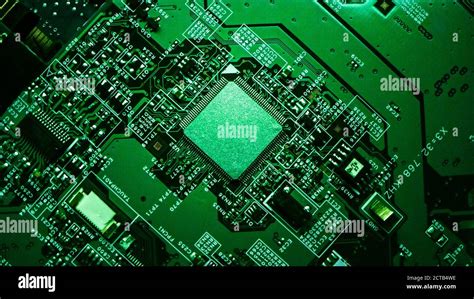 Macro Close Up Shot Of Microchip Cpu Processor On Green Printed