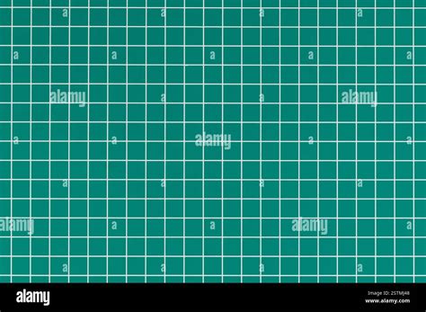 Vibrant Green Crafting Surface Featuring Grid Pattern Ideal For