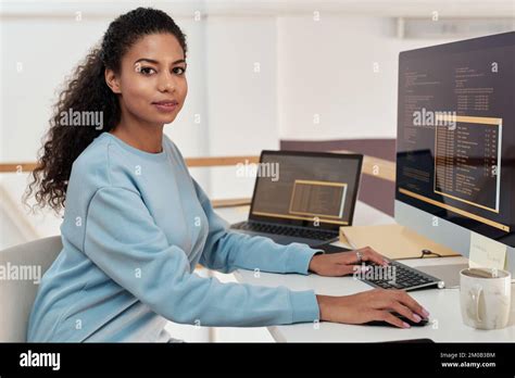 Portrait Of Female Programmer Working On Computer In Modern Office Of IT Company Stock Photo Alamy