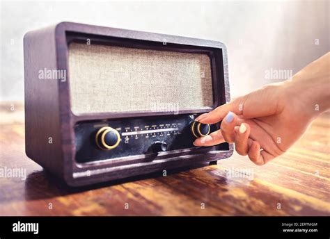 Retro Radio Tuning Woman Using Old Vintage Music Equipment Adjusting Volume Or Frequency Tuner