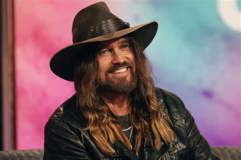 How Glam Elizabeth Hurley Fits In With Billy Ray Cyrus In Low Key