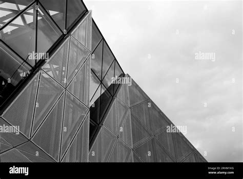 Black And White Tone Exterior View Of Mixture Various Triangular Pattern Of Aluminium Cladding