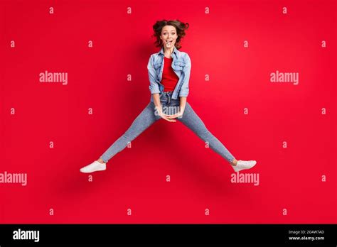 full length body size photo of careless cheerful girl jumping up