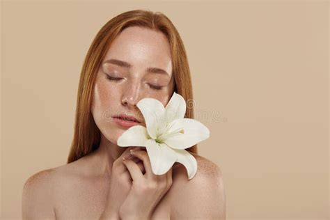 Redhead Girl With Naked Shoulders Hold Lily Flower Stock Image Image