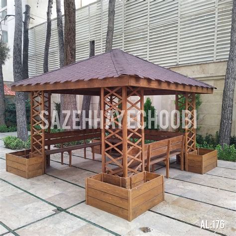 آلاچیق فلاور باکس دار تمام چوب دارای نیمکت تمام چوب سازه های چوبی