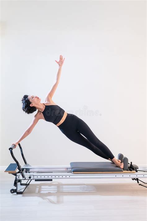 Asian Woman Doing Pilates On Reformer Stock Image Image Of Alignment