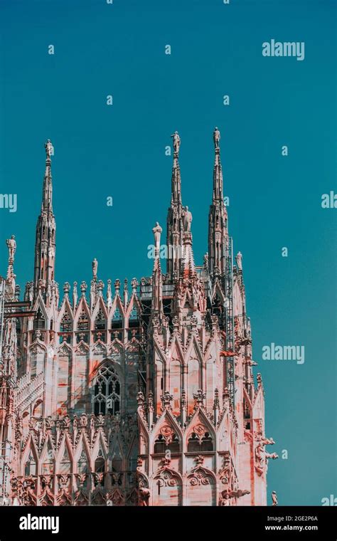 Beautiful Historical Milan Cathedral Against The Blue Sky In Italy