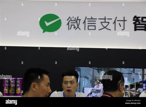 file people visit the stand of the messaging app weixin or wechat