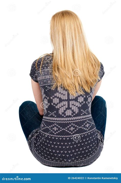 Back View Of Beautiful Woman Relaxes And Looks Into The Distance Stock