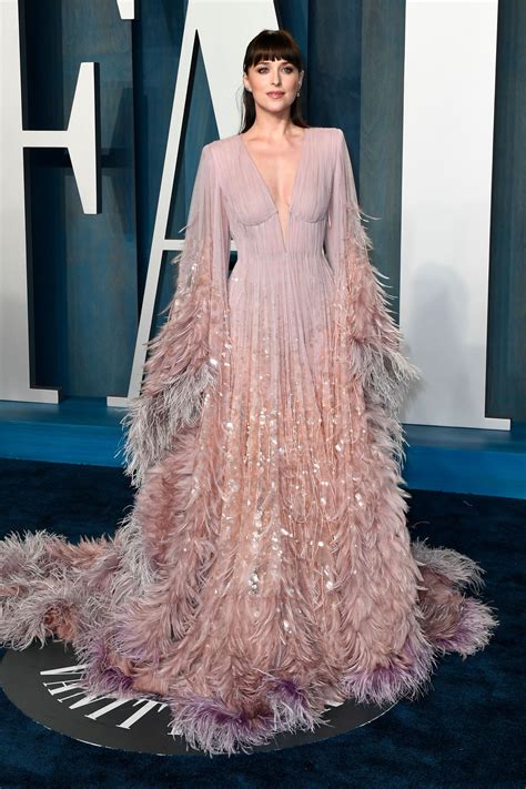 Dakota Johnson Dazzles In A Feathered Gucci Gown At The Oscars After Party British Vogue