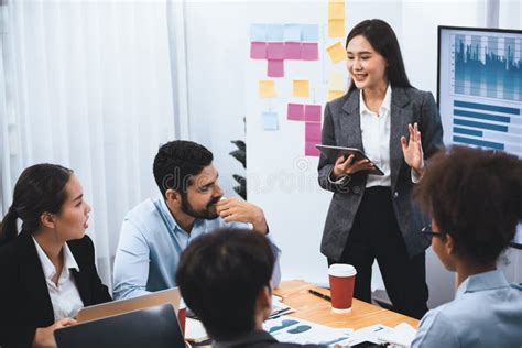 Young Asian Businesswoman Presenting Data Analysis Dashboard On Tv Concord Stock Image Image