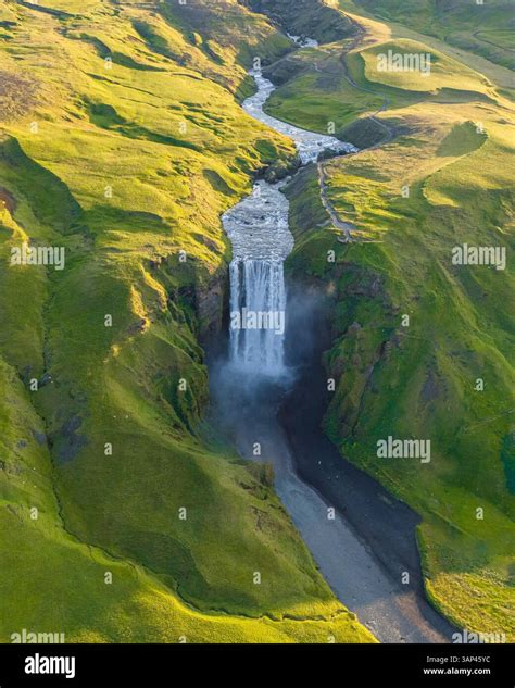 Aerial Drone View Of Skógafoss Waterfall During Sunrise In Summer Time