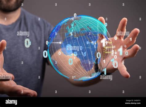Businessman Holding A Floating Render Of A Globe With Binary Code