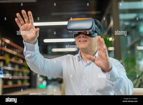 Mature Business Man Programmer Software Developer Using Headset App Making A Presentation