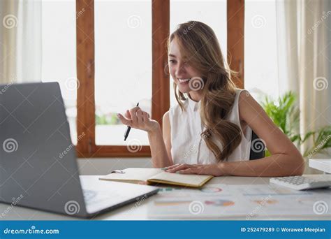Attractive Smiling Young Asian Woman On A Video Call By Laptop Computer Stock Image Image Of