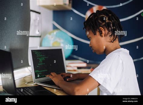 Female Babe Learning Coding On Laptop At Table Stock Photo Alamy