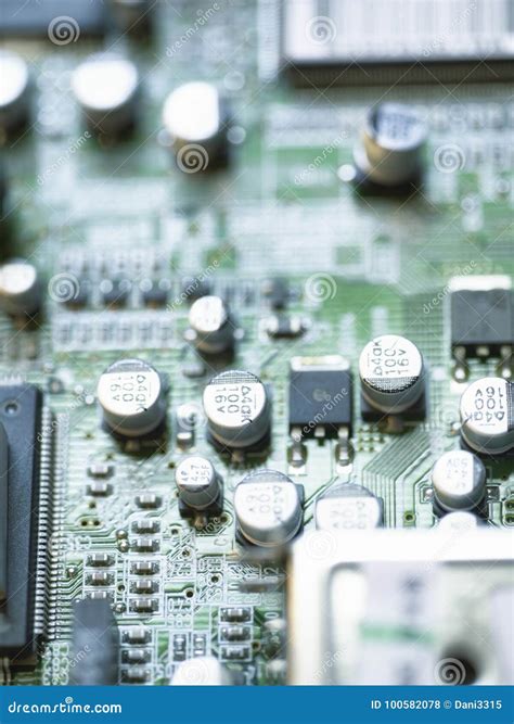 Electronic Microcircuit With Microchips And Capacitors Taken Closeup