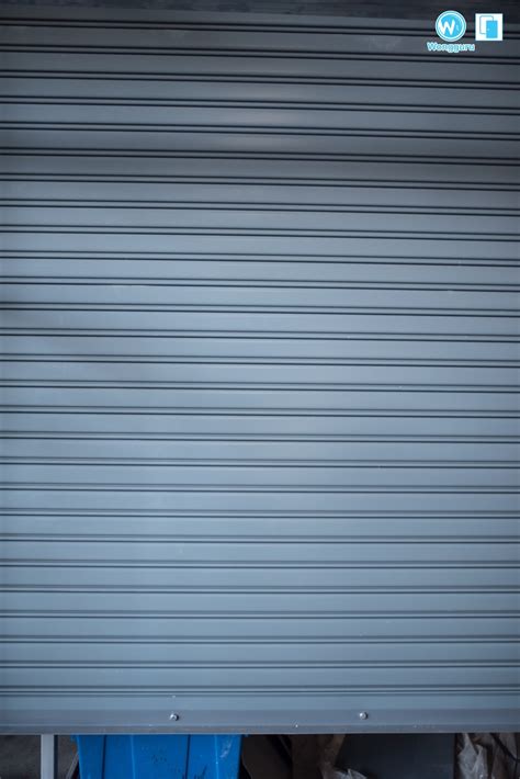 งานติดตั้งประตูม้วนมอเตอร์ไฟฟ้า ร้านขายวัสดุก่อสร้าง Wongguru