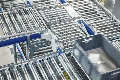 Transportation Line Conveyor Roller With Container In Motion Stock Image Image Of Indoors