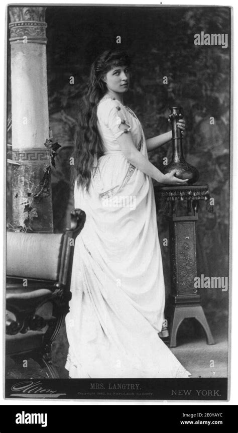 Lillie Langtry Full Length Portrait Standing Facing Right Holding Vase On Stand