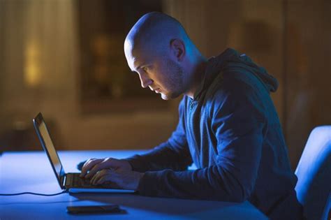 Premium Photo Hacker Using Laptop Computer For Cyber Attack