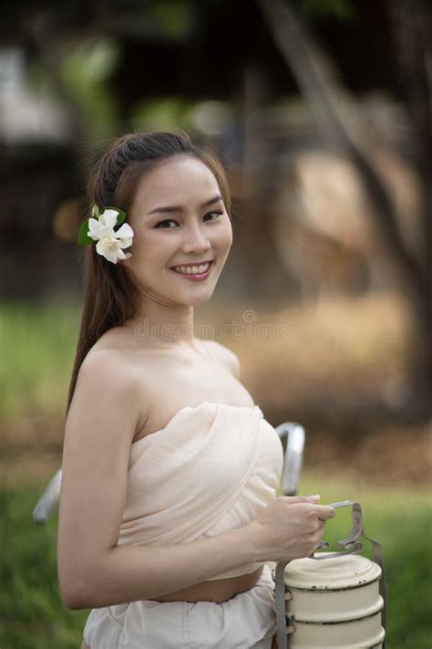 Beautiful Asian Woman Wearing Traditional Thai Clothing In Chiang Mai