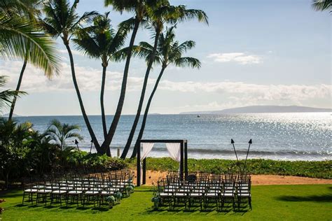 The Ocean Glistens In The Background At This Maui Wedding Ceremony