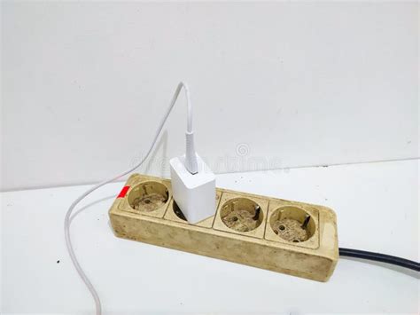 Old But Still Functioning Plug Or Socket With Charger Included Stock Image Image Of