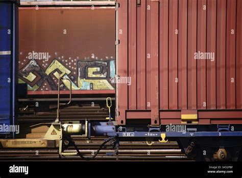 The Outer Body Of A Train With A Trailer Coupling Made Of Silencers And