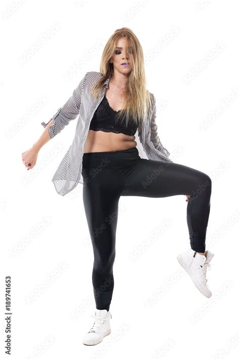 Passionate Energetic Sexy Dance Hall Female Dancer Looking Down With Tousled Hair Full Body