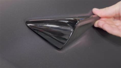 Premium Stock Video Reinstalling Cars Side Camera After Vinyl Foil