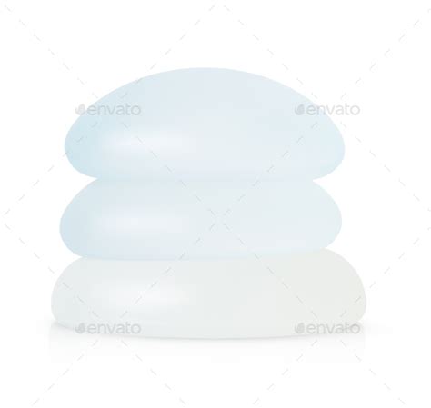 Stack Of Different Types Of Breast Implants Isolated On White Background Stock Photo By Tania